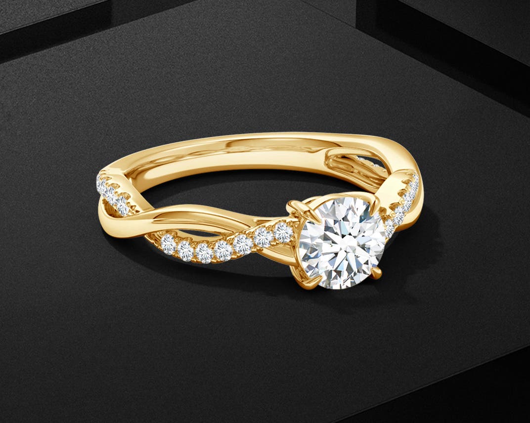 Emerald-Cut Solitaire Aquamarine Infinity Twist Ring | Angara