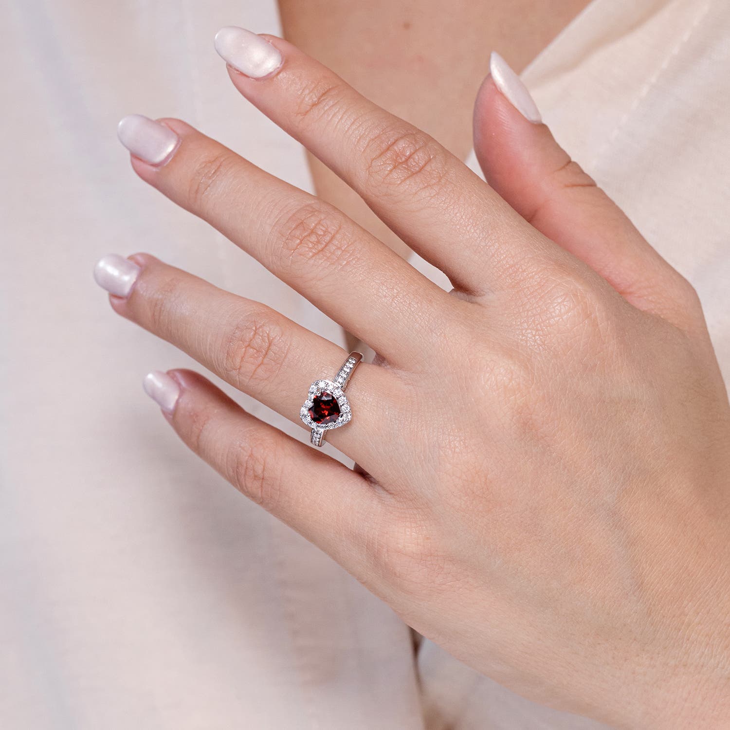 Heart-Shaped Garnet Halo Ring with Diamond Accents