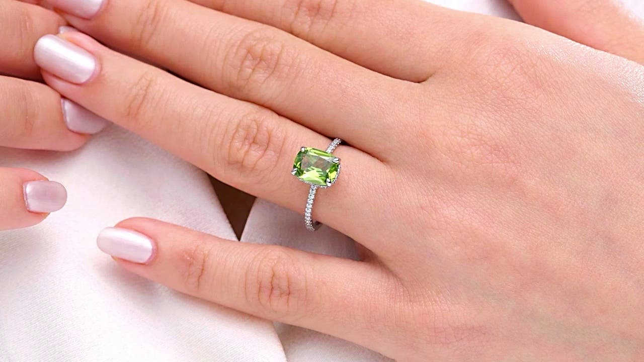 Thin Shank Cushion Cut Peridot Ring With Diamond Accents Angara