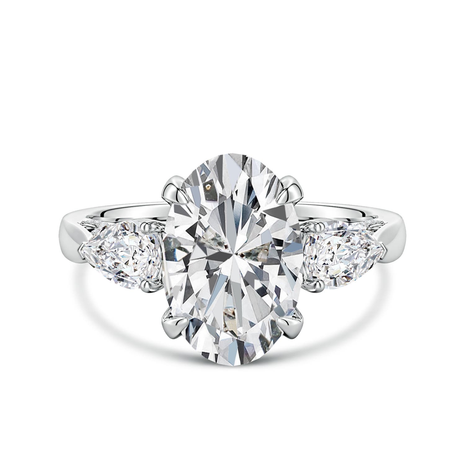 Oval and Sideways Pear Diamond Three-Stone Engagement Ring